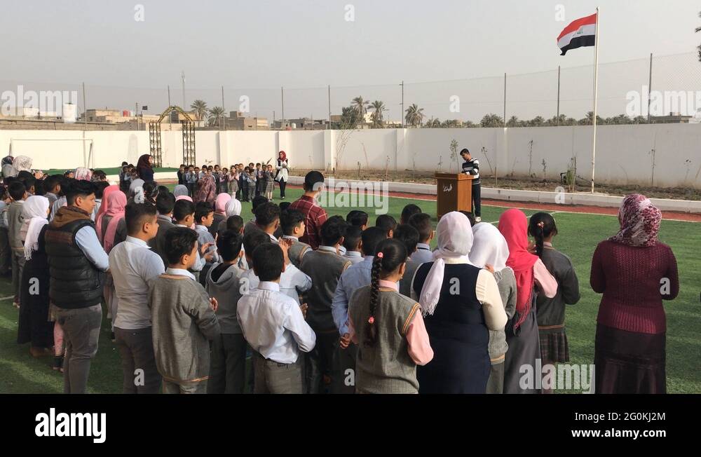 School assembly at a school for children orphaned by ISIS near Basra ...