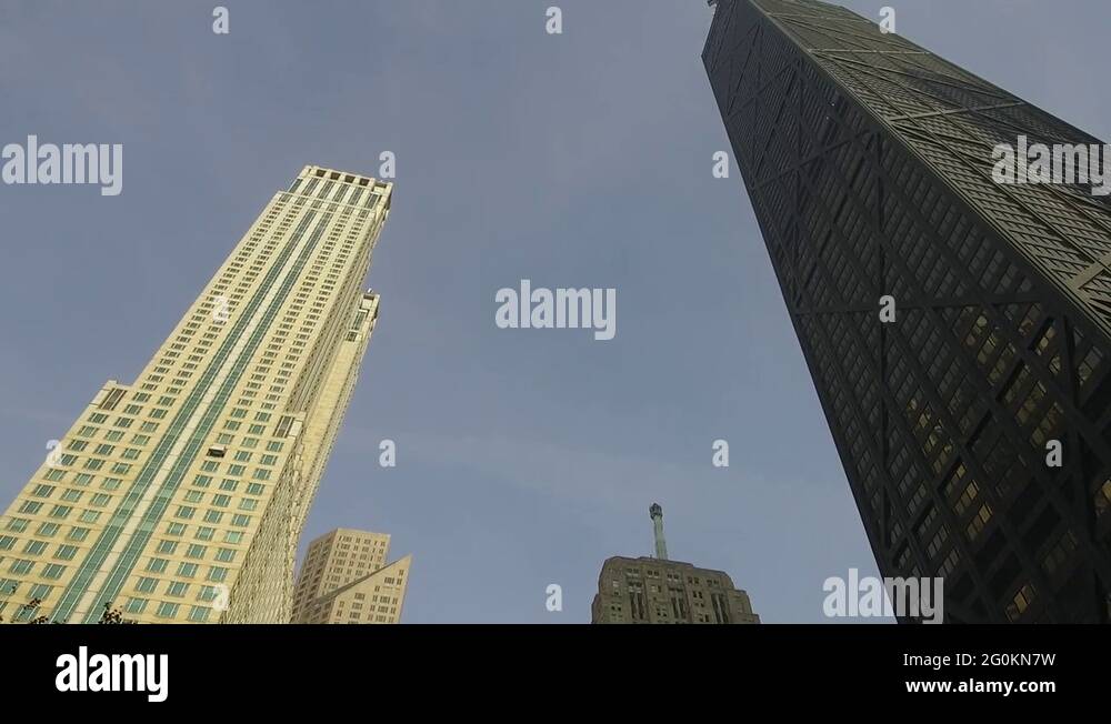 Tall Buildings From Below In City - Pan - Left To Right Stock Video ...