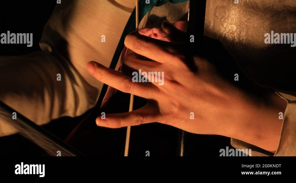 Korean female musician playing the Haegeum, Korean traditional string ...