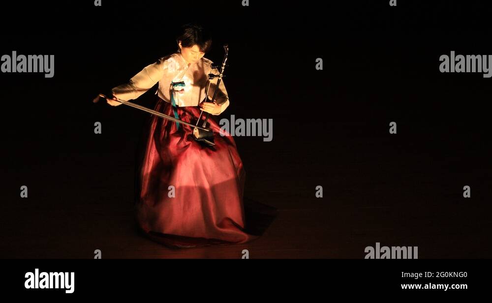 Korean female musician playing the Haegeum, Korean traditional string ...