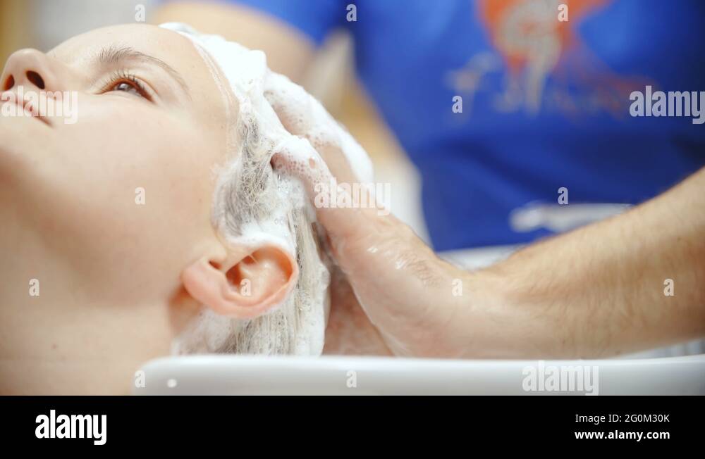Woman shampooing hair Stock Videos & Footage - HD and 4K Video Clips ...