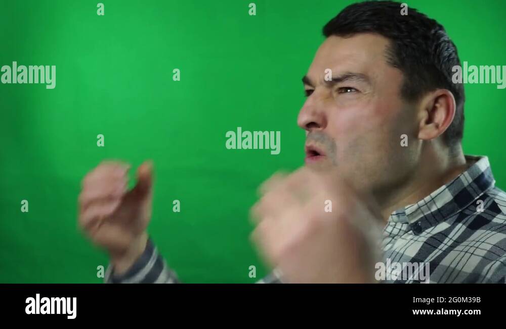 Angry crazy angry man screaming against green screen background Stock ...