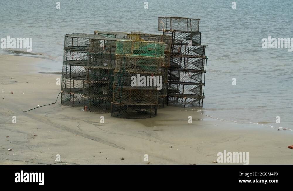 Lobster Crab Traps on the Beach Stock Video Footage - Alamy