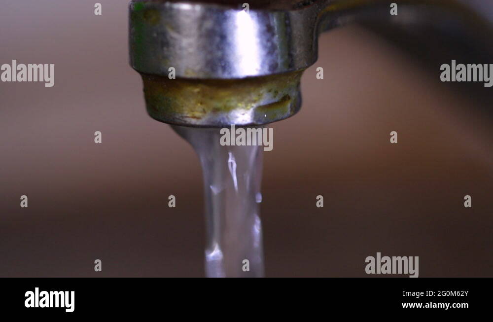 Water flows from the tap Stock Video Footage - Alamy
