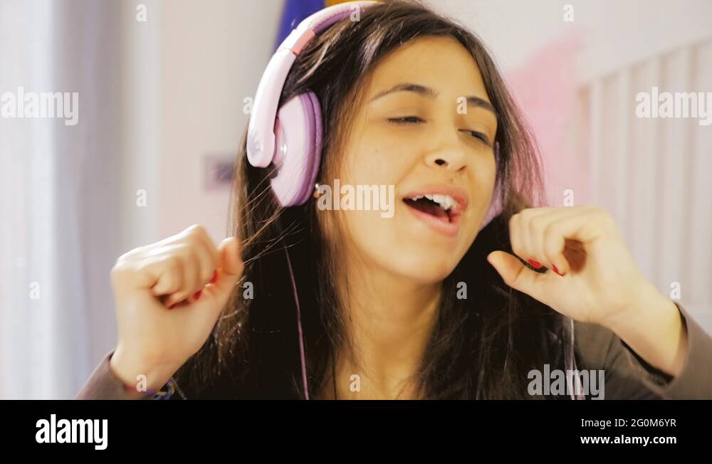 Woman hearing song using headset Stock Videos & Footage - HD and 4K ...