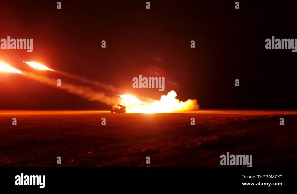 Multiple rocket launcher firing ground to ground missiles Stock Video ...