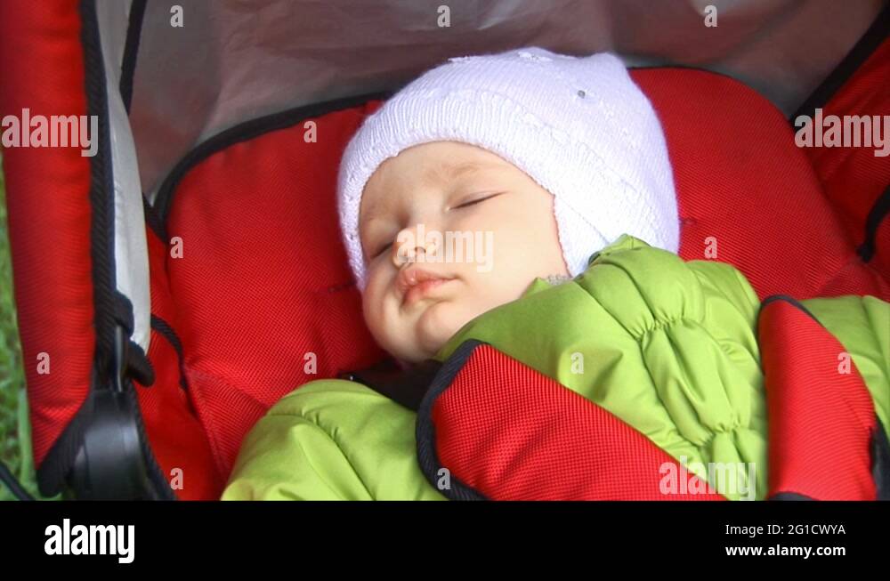 little girl smiles in the sleep Full HD Stock Video Footage - Alamy