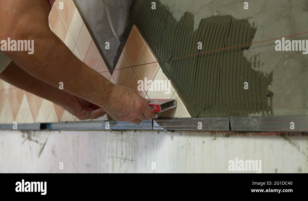Worker installing tiles Stock Videos & Footage - HD and 4K Video Clips ...