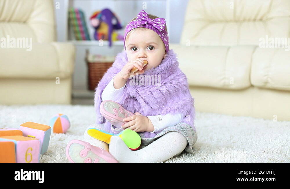 Baby girl eating cookie Stock Videos & Footage - HD and 4K Video Clips ...