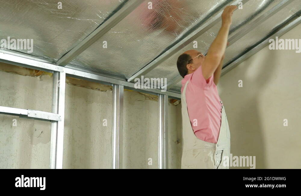 Installation of gypsum plasterboard ceilings Stock Video Footage - Alamy