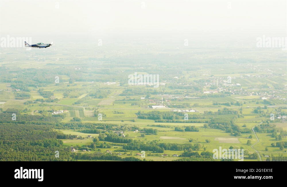 Light aircraft plane aeroplane flying machine Stock Videos & Footage ...