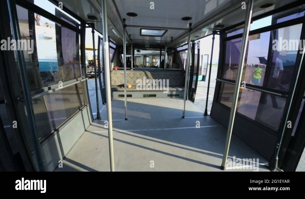 Empty bus for airport passengers transfer, shown in motion Stock Video ...