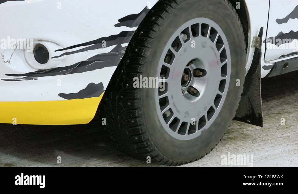Wheel of race car which begins ride by ice Stock Video Footage - Alamy