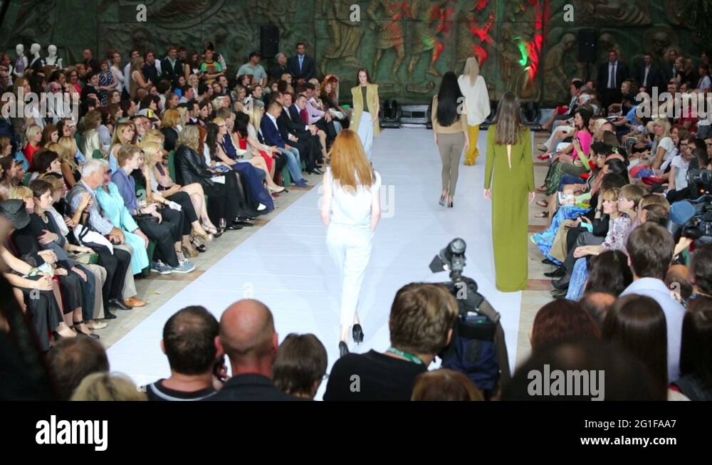 Beautiful young girls on fashion show podium with crowd Stock Video ...