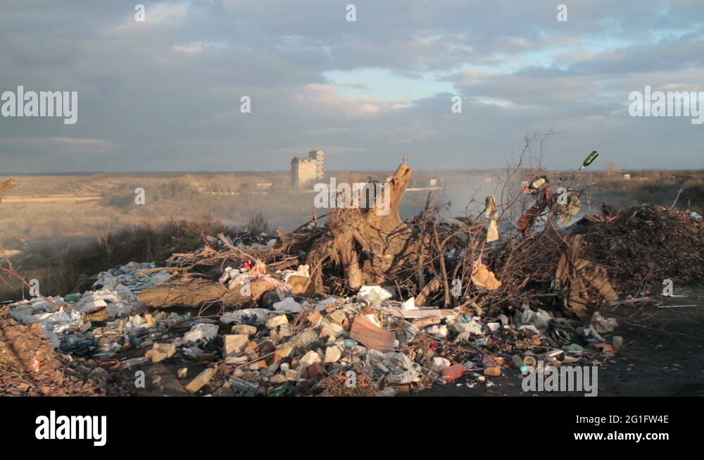 Burning garbage dump, ecological pollution. spontaneous garbage dump ...