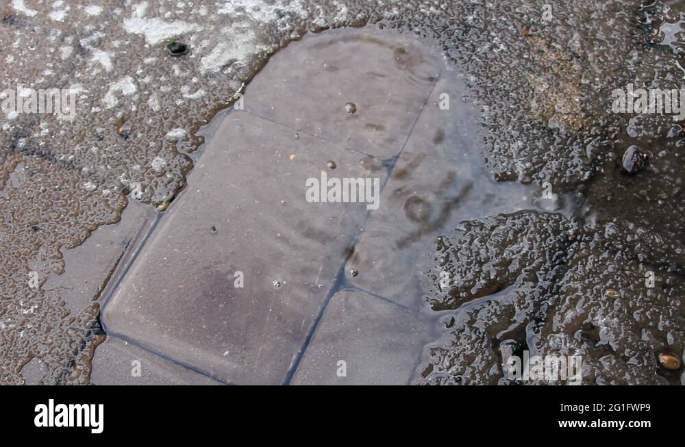 Ice on pavement Stock Videos & Footage - HD and 4K Video Clips - Alamy