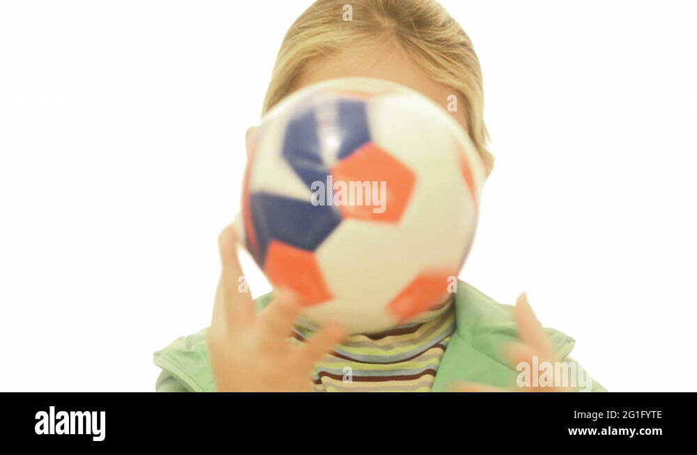 little girl spinning the ball in his hands Stock Video Footage - Alamy