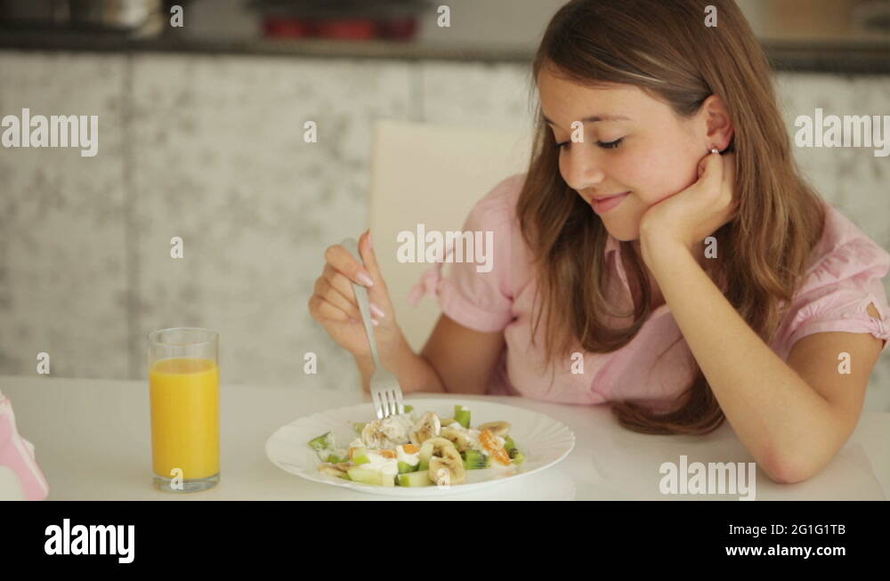 Cute girl sitting kitchen table Stock Videos & Footage - HD and 4K ...