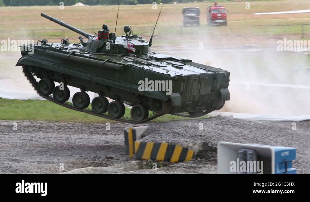 Tracked infantry fighting vehicle BMP-3 jumps from springboard Stock ...