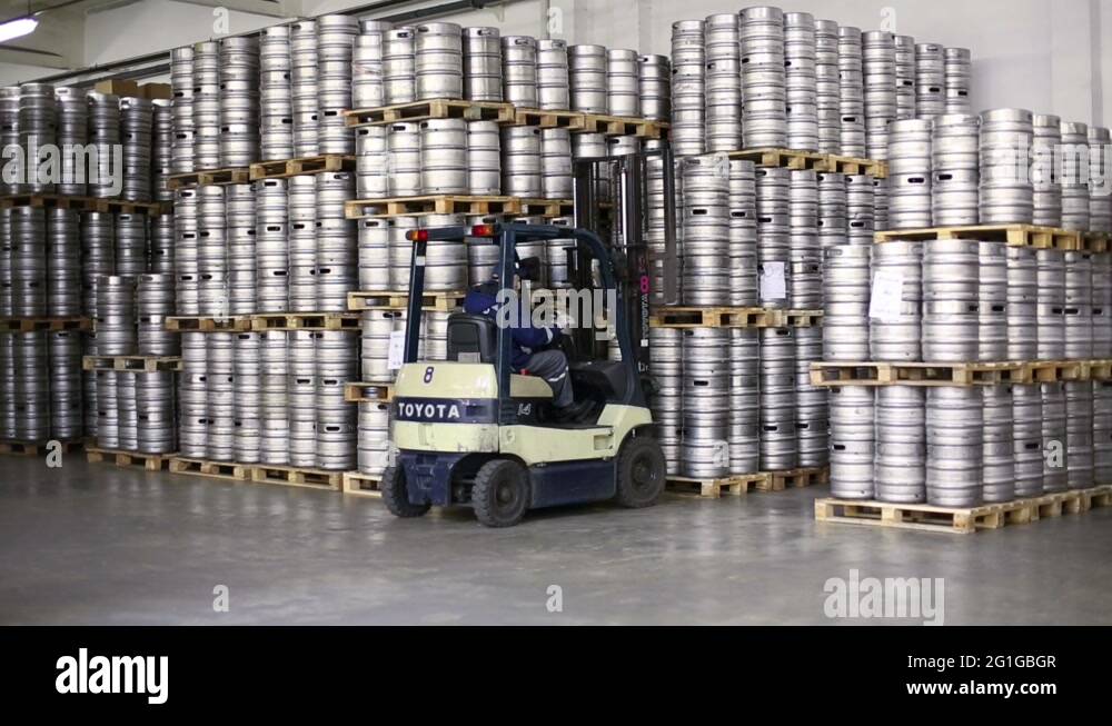 Autoloader loading beer kegs in warehouse of brewery Ochakovo Stock ...