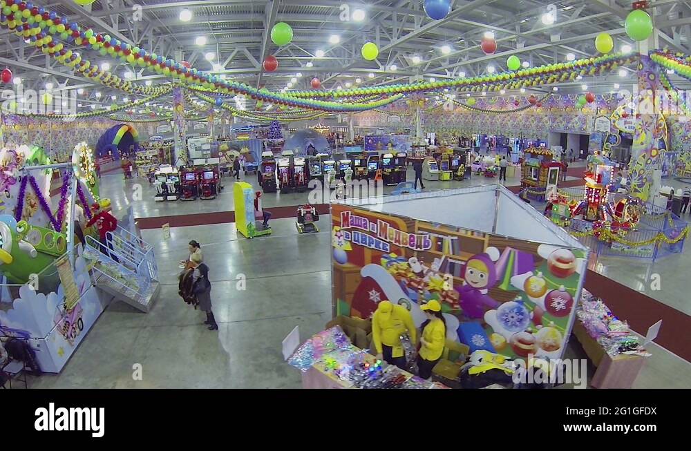 Amusements arcade and stalls with souvenirs in Crocus City hall Stock ...