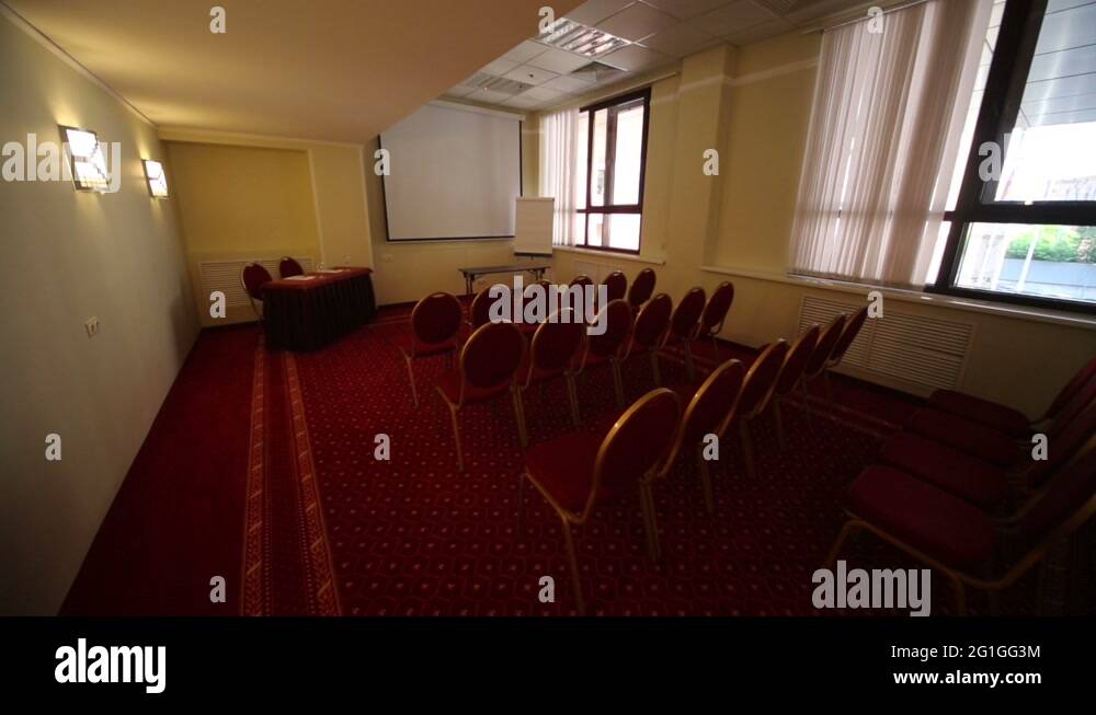Light switch off and on in conference room with chairs Stock Video ...