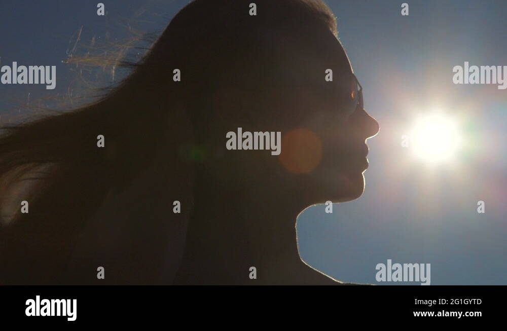 Woman face in the sun Stock Videos & Footage - HD and 4K Video Clips ...