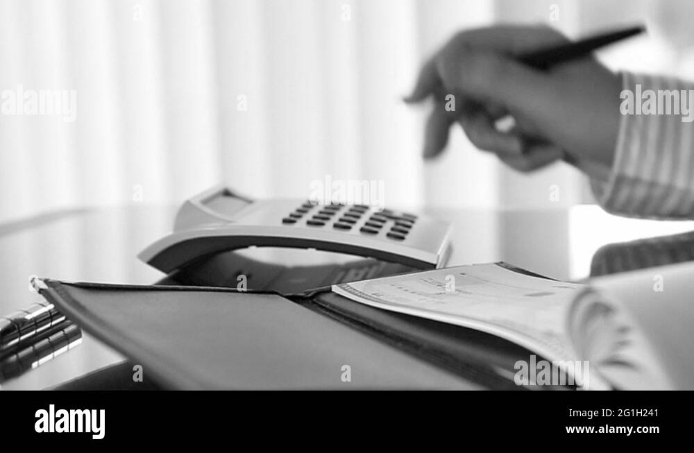writing a cheque with black and white toned Stock Video Footage - Alamy