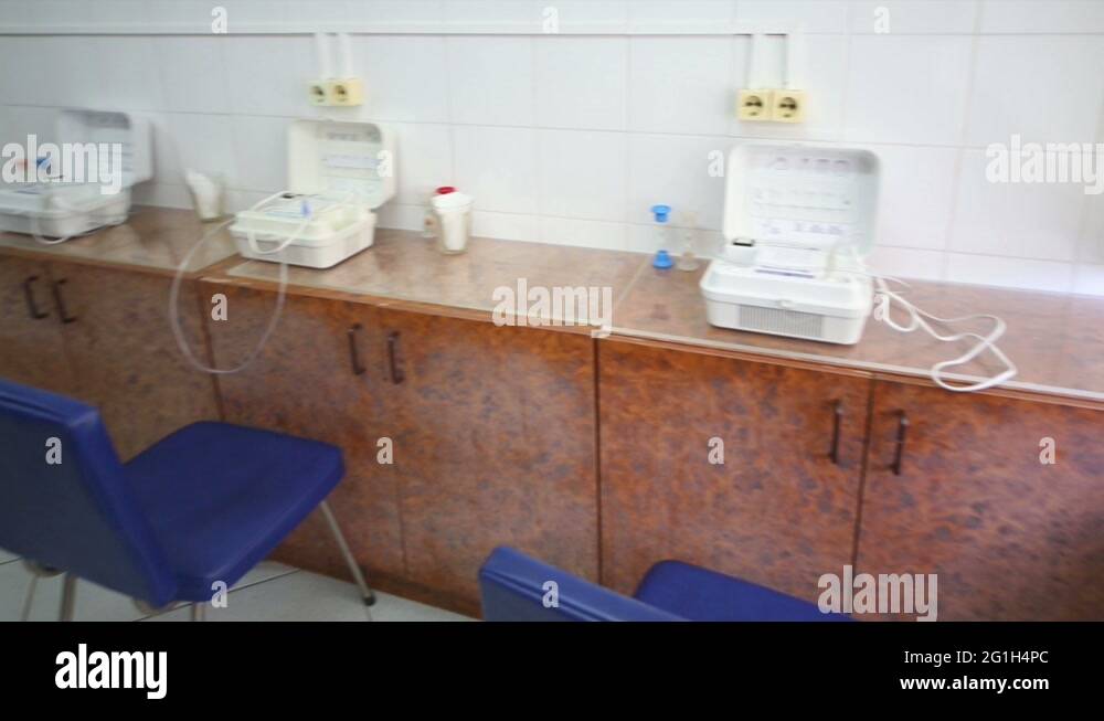 Room for inhalation with three inhalers on table and chairs Stock Video ...