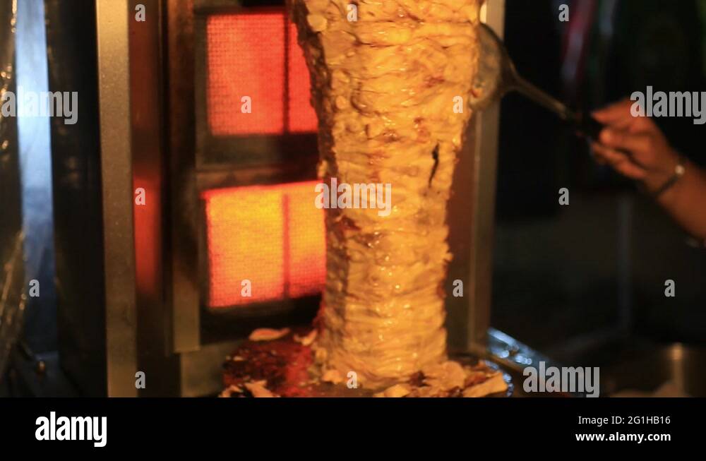 Cut meat roasted on a spit torque in Thailand Market. HD. 1920x1080 ...