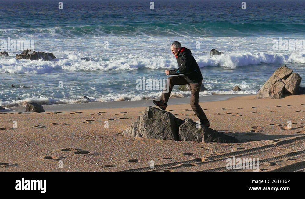 Man running in waves Stock Videos & Footage - HD and 4K Video Clips - Alamy