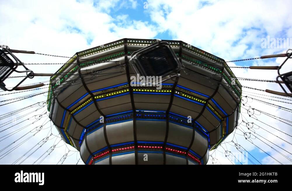 Carousel spinning on sky background with clouds. HD. 1920x1080 Stock ...