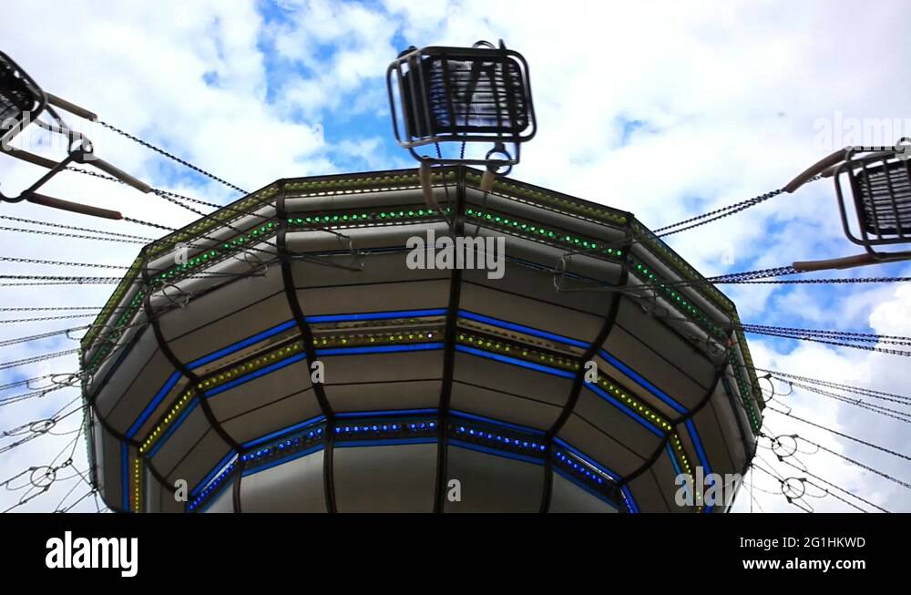 Carousel spinning on sky background with clouds. HD. 1920x1080 Stock ...