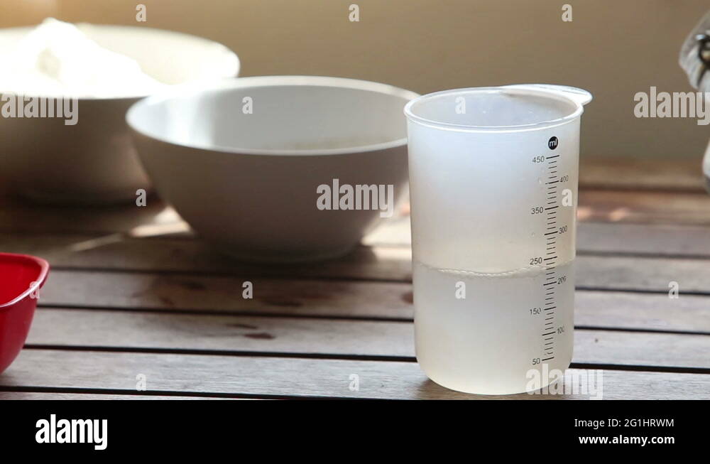 Water measuring cup Stock Videos & Footage - HD and 4K Video Clips - Alamy