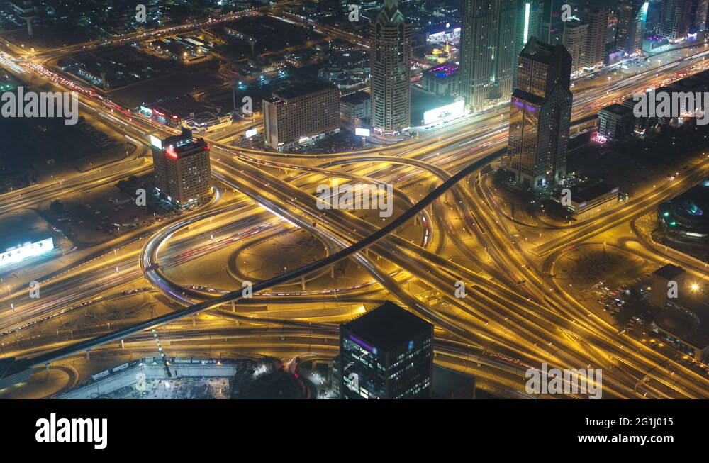 Aerial view of highway junction in Dubai, UAE. View from the height of ...