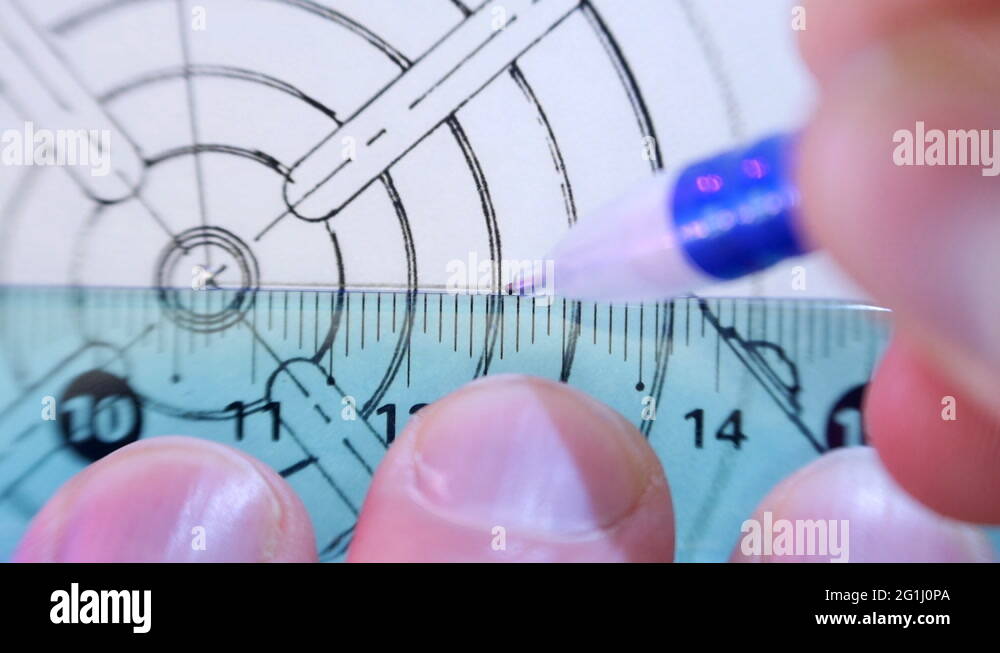 Drawing a pencil line on the ruler on the drawing sheet Stock Video ...