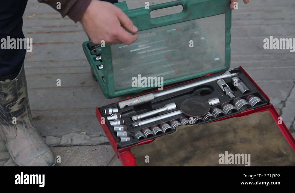 Mechanic holding spanner repairing vehicle Stock Videos & Footage - HD ...