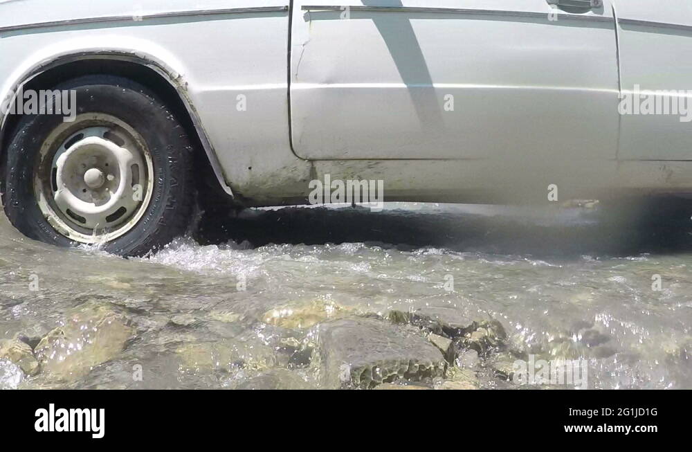 Car ford crossing Stock Videos & Footage - HD and 4K Video Clips - Alamy