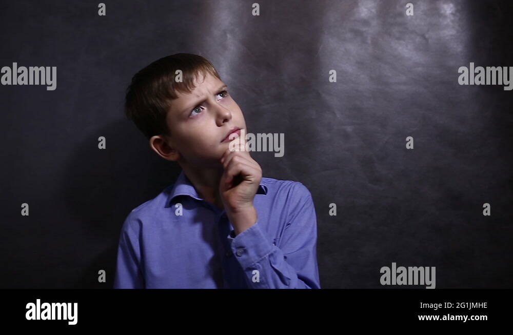 Teenage boy thinking serious Stock Videos & Footage - HD and 4K Video ...