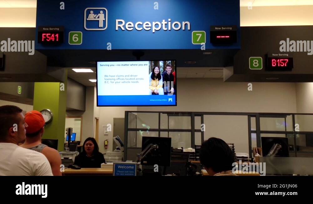 People line up for applying driver license at reception site Stock ...