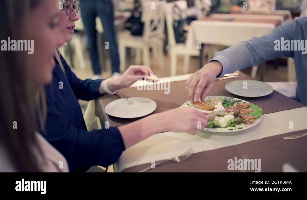 Young people restaurant eating Stock Videos & Footage - HD and 4K Video ...