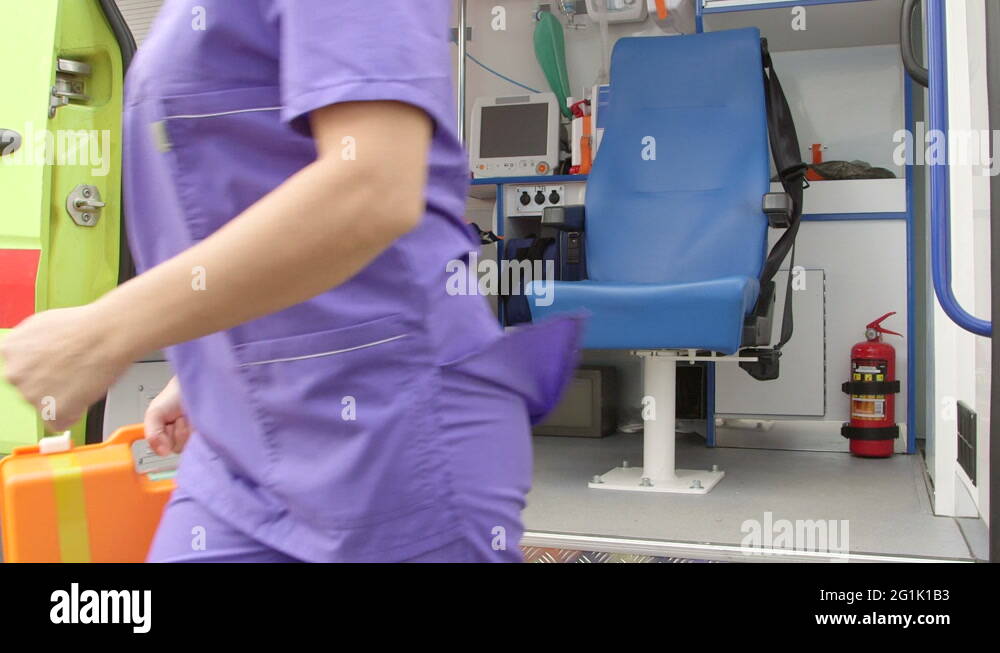 Emergency medical ambulance service paramedic rush to crash scene Stock ...