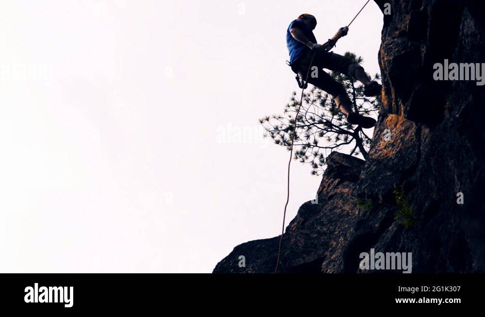 descent down danger or normal route, the conqueror of vertices. climber ...