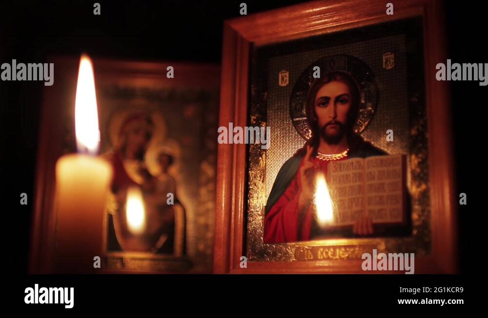 Jesus Christ Icon in the light of candle Stock Video Footage - Alamy