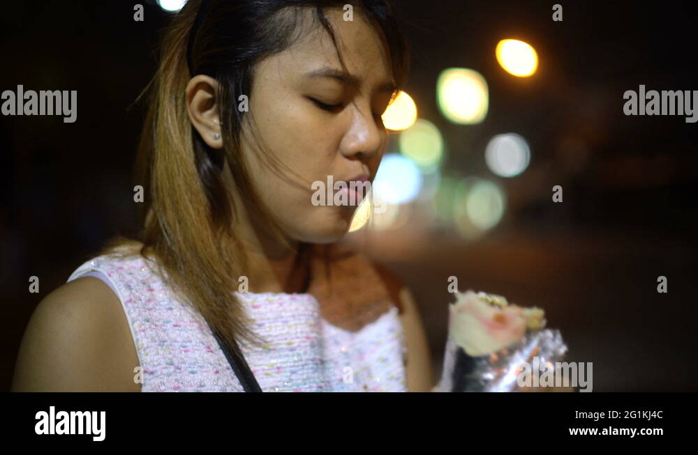 Young Asian Woman eating kebab 4k UHD (3840x2160 Stock Video Footage ...