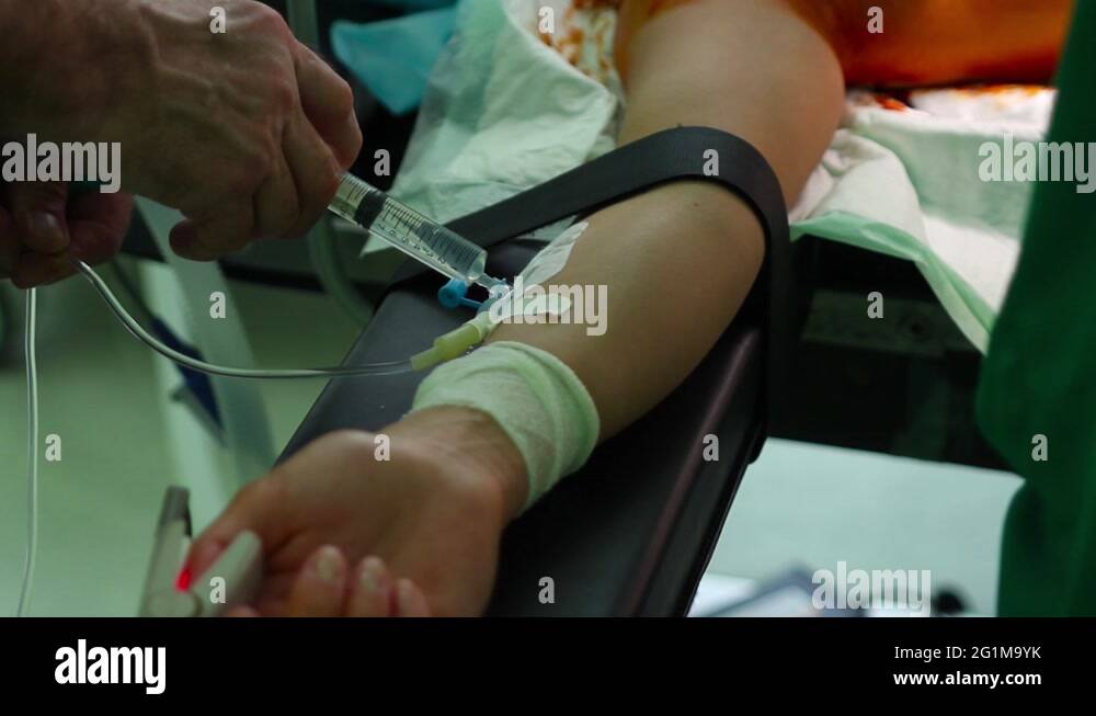 anesthesia, the doctor inserts a catheter Stock Video Footage - Alamy