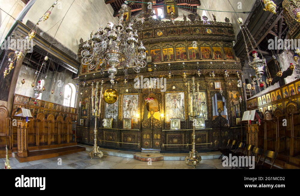 Church of the Nativity interior with hall colonnade, altar and icon ...