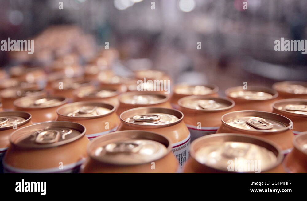 Soda cans production line on Pop and Soda, carbonated drink, factory ...