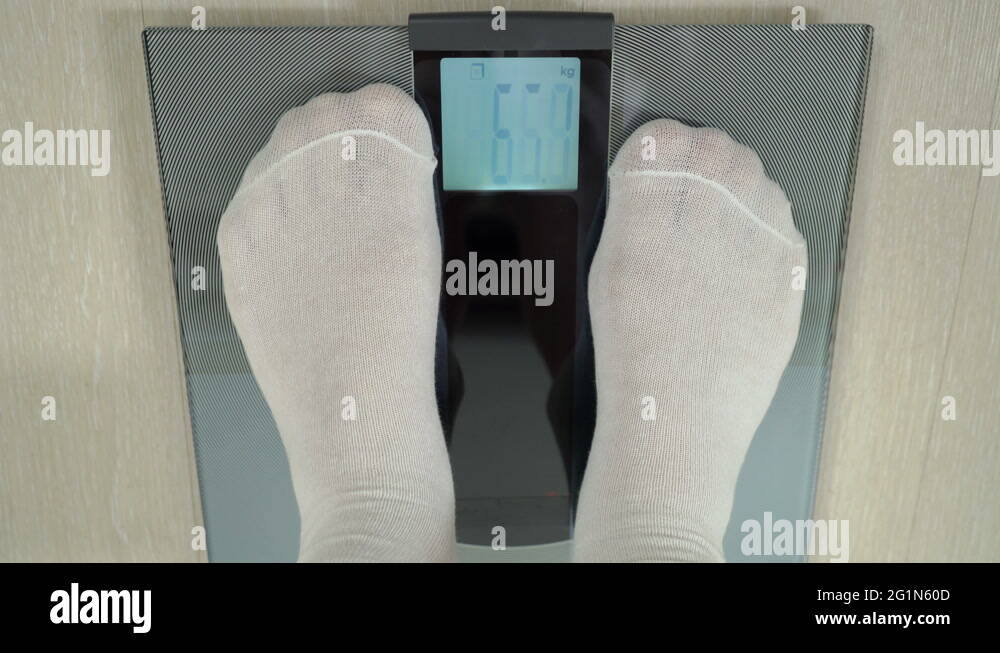 Measuring scale weight feet Stock Videos & Footage - HD and 4K Video ...