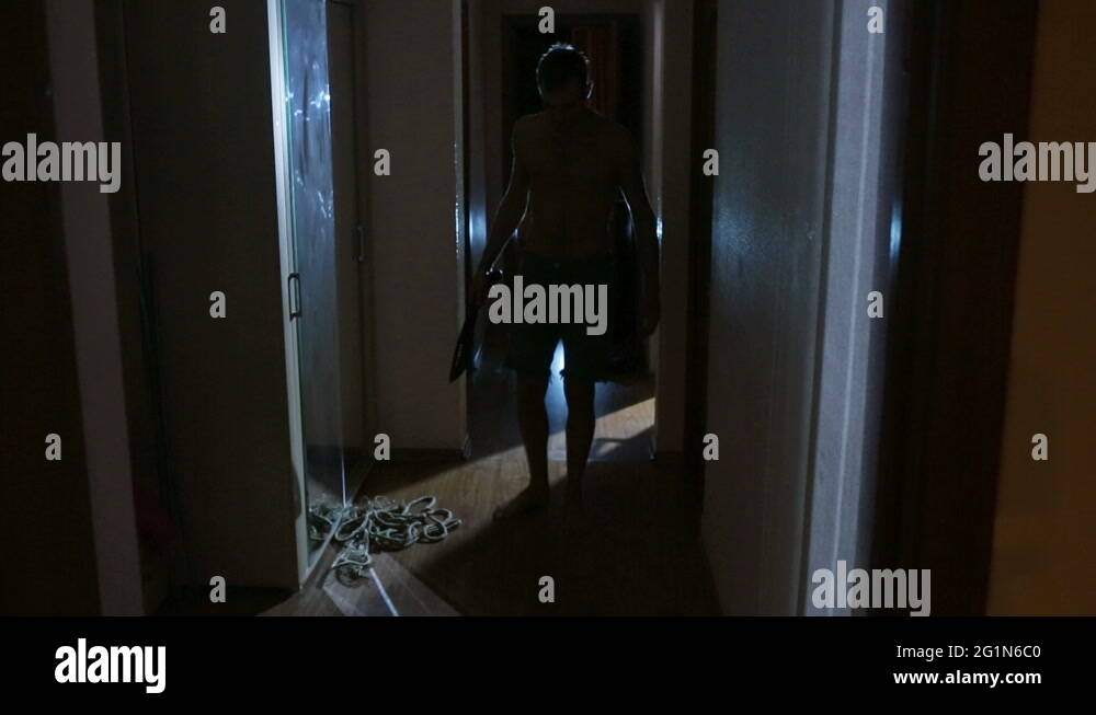 zombies maniac with a knife down the hallway. horror Stock Video ...